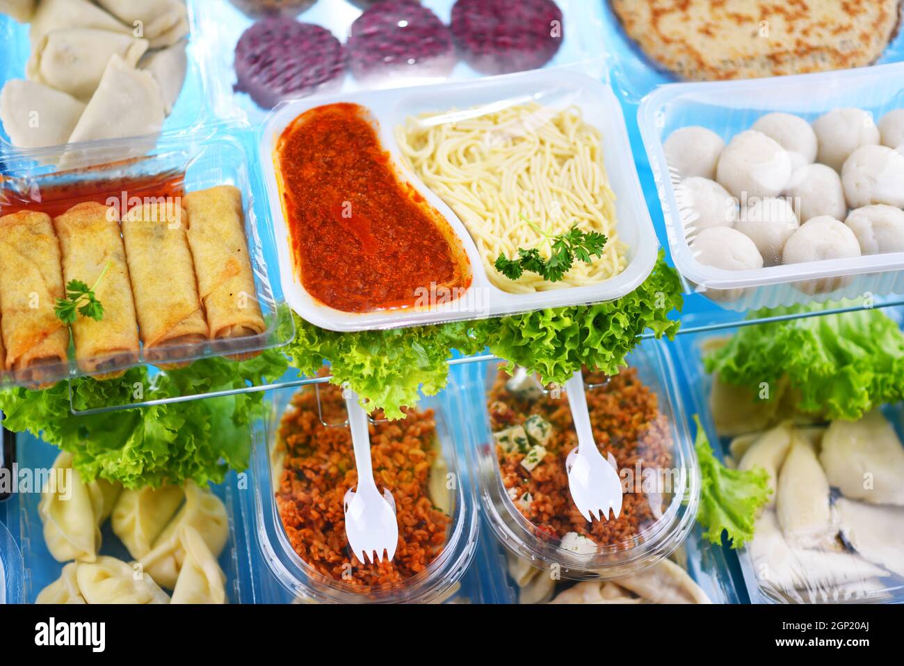 A variety of prepackaged food products in plastic boxes Stock Photo - Alamy