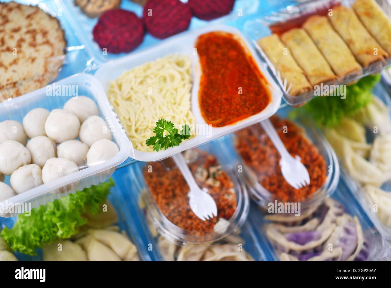 A variety of prepackaged food products in plastic boxes Stock Photo - Alamy