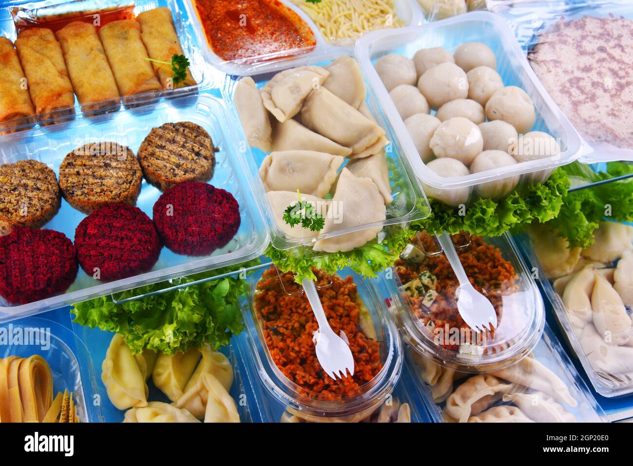 A variety of prepackaged food products in plastic boxes Stock Photo - Alamy