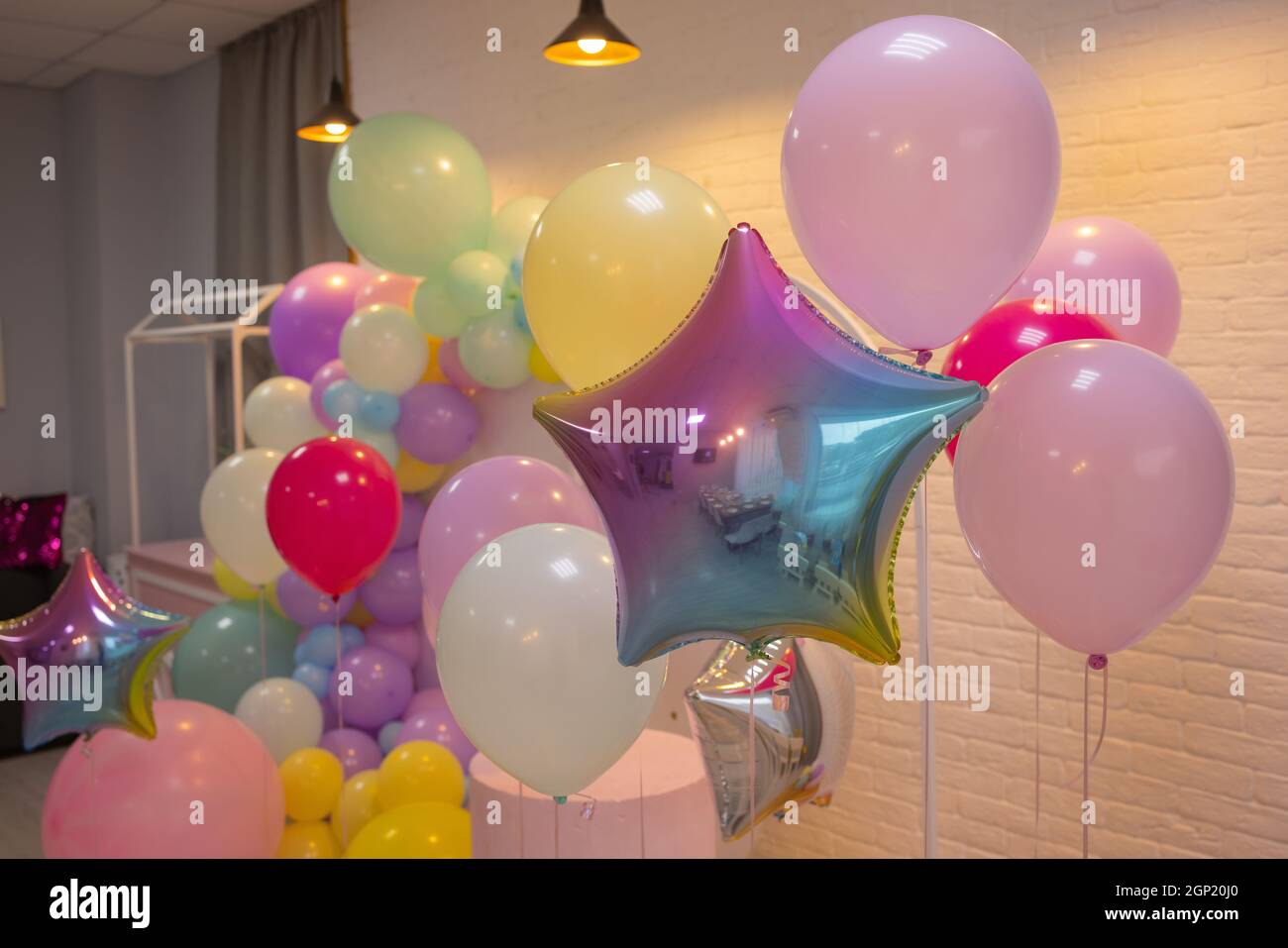 balloons are attached to the railing of the porch. Opening of the store ...
