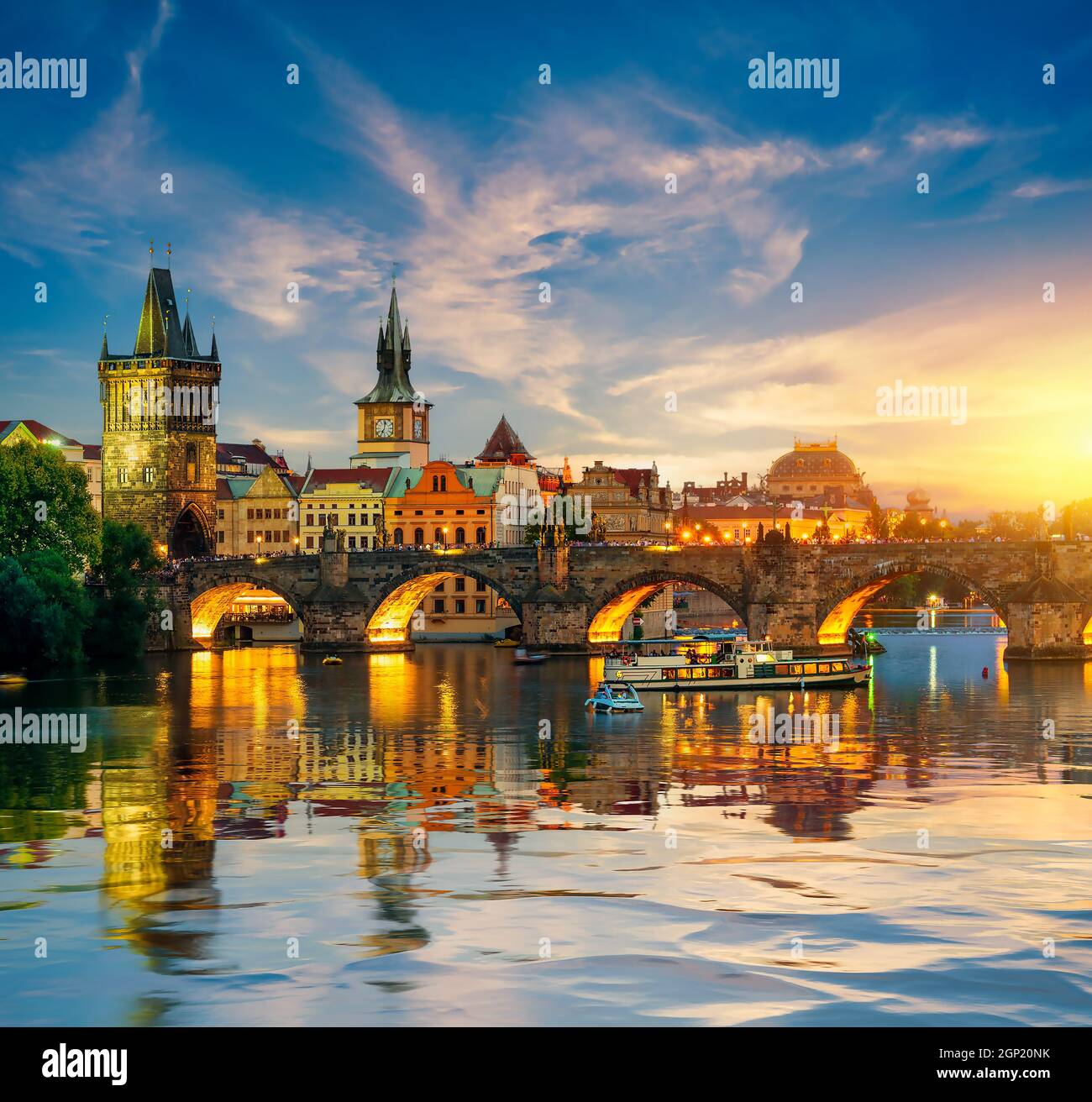 Fiery sunset over Charles bridge on river Vltava in Prague Stock Photo ...