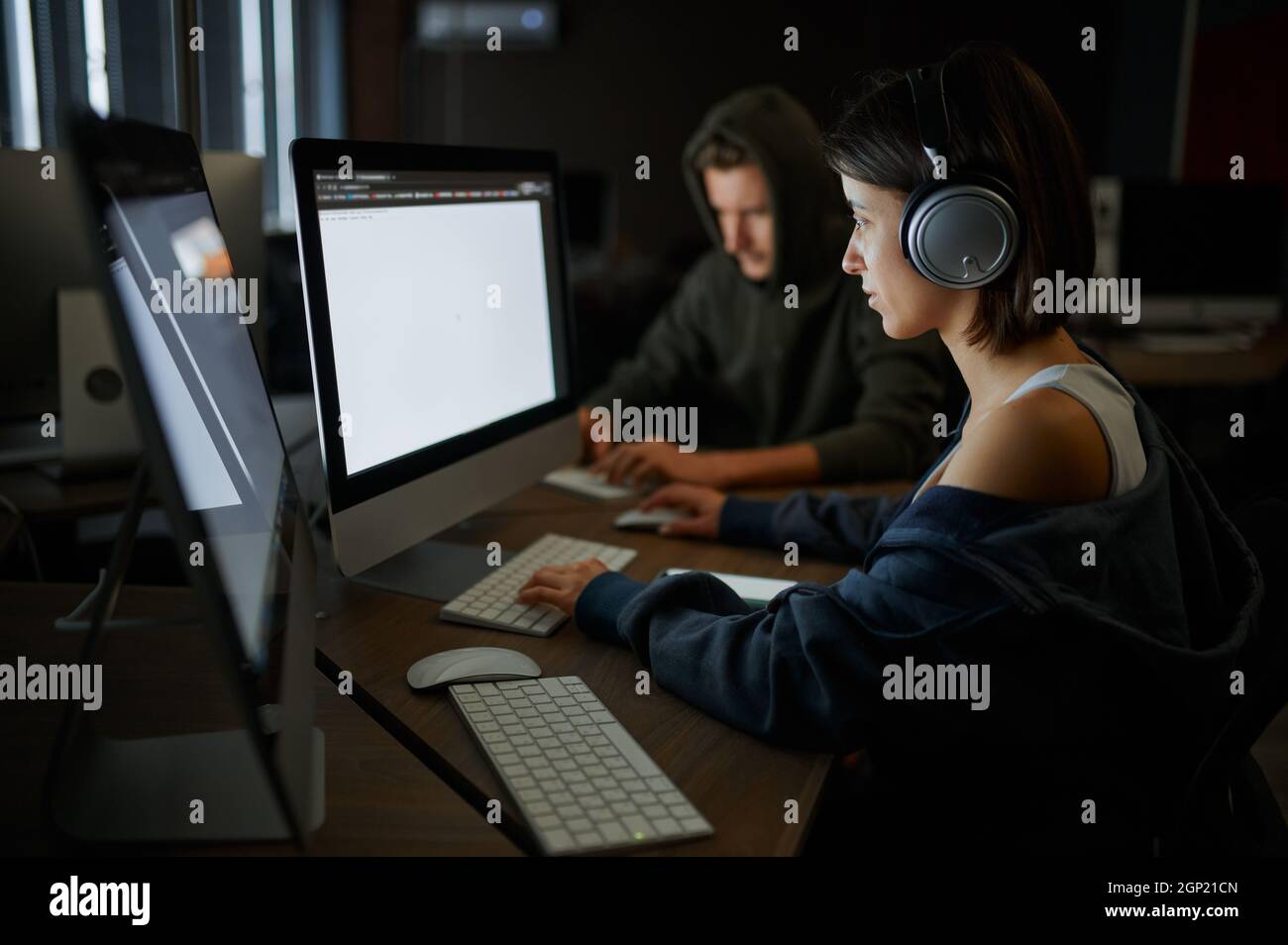 Internet hackers works on computers, dangerous teamwork. Illegal web ...