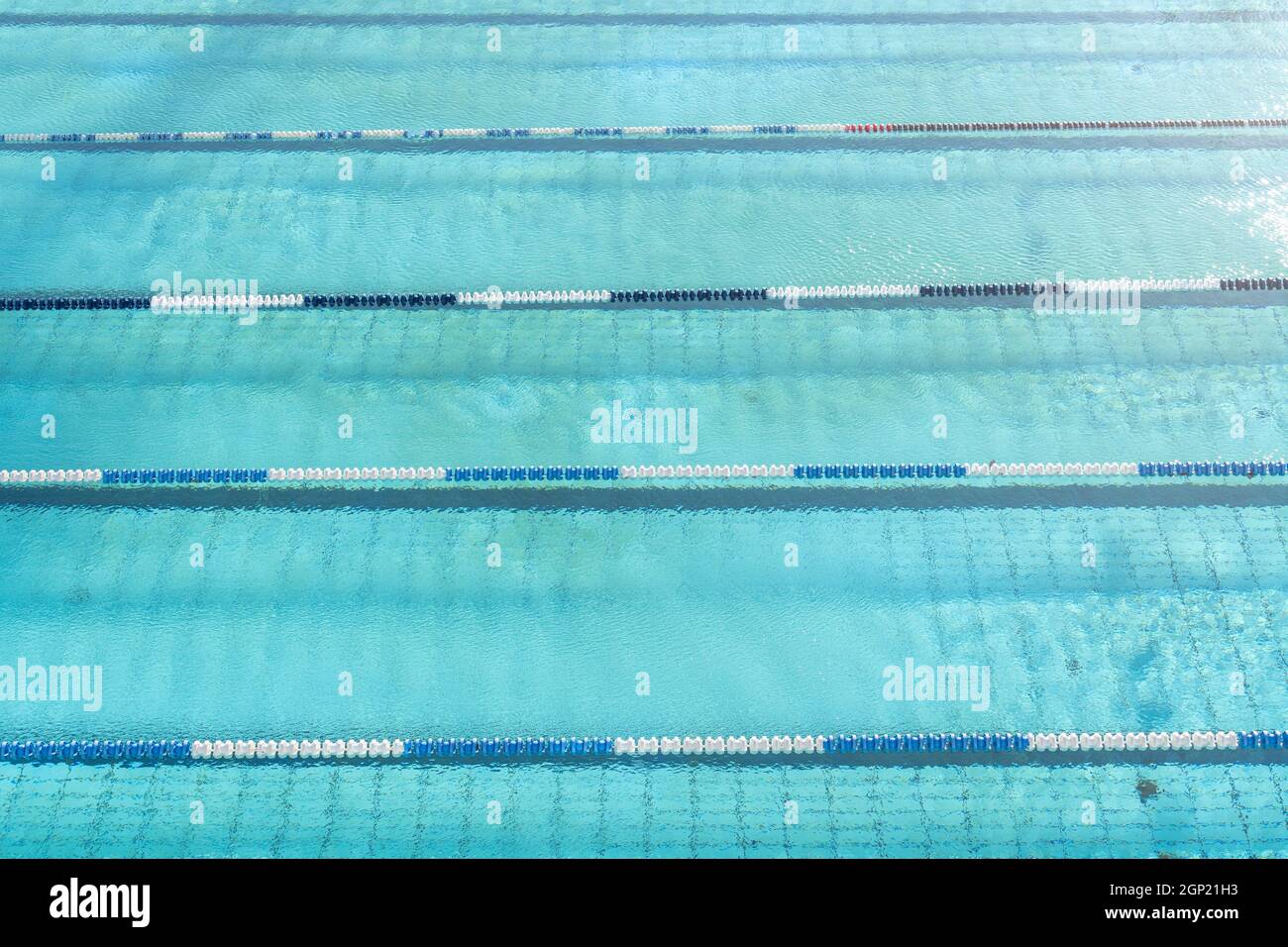 Details view of and outdoor swimming pool with sunlight Stock Photo - Alamy