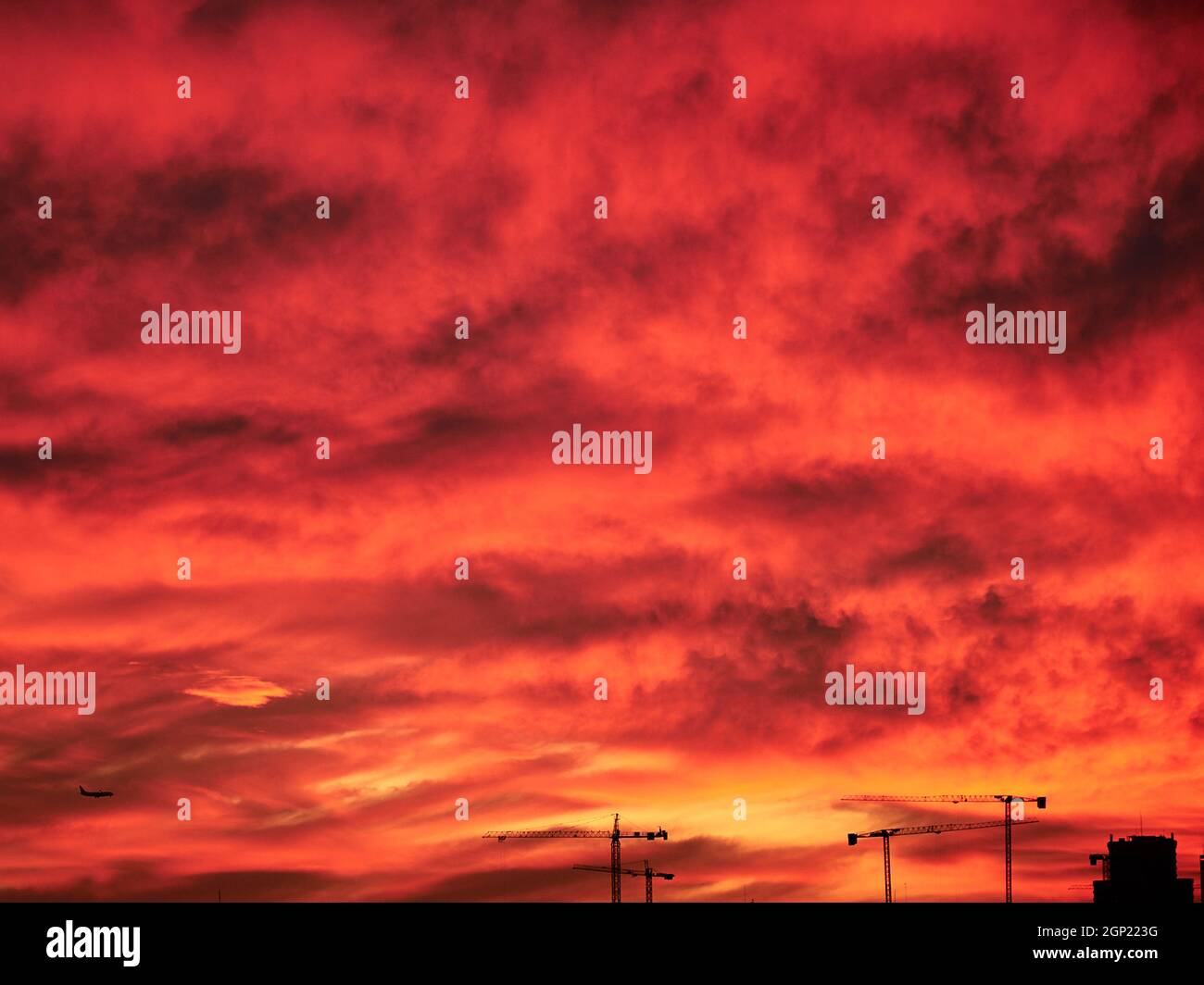 Sunset. Heaven, orange sky. Sun rays. Wallpaper. Clouds Stock Photo - Alamy