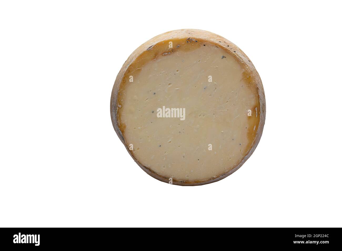 One round old cheese. Old cheddar cheese. Delicious cheese on a white ...