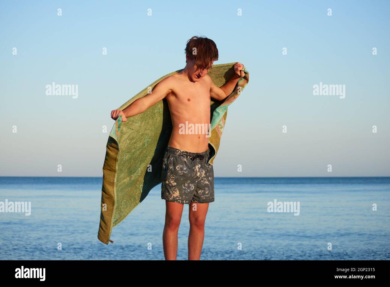 Drying himself towel hi-res stock photography and images - Alamy