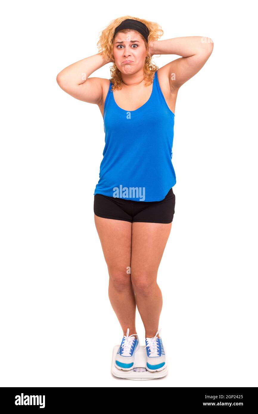 Fat woman very worried with her weight Stock Photo - Alamy