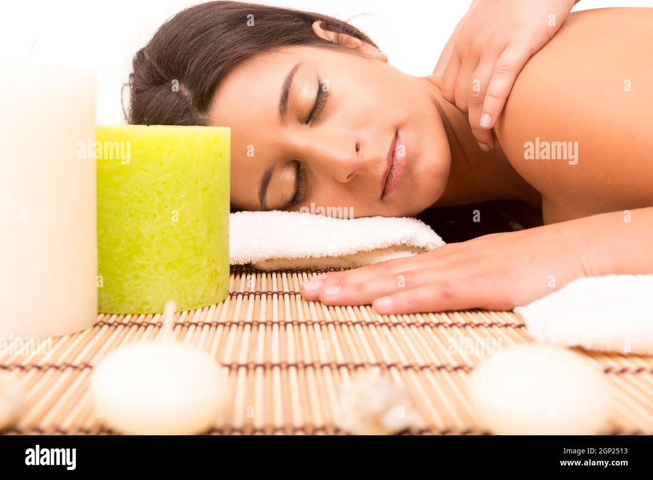 A young beautiful woman relaxing at a spa (wellness concept Stock Photo ...