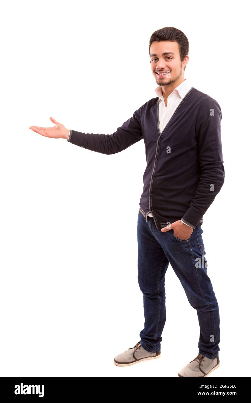 Young man presenting your product, isolated over a white background ...