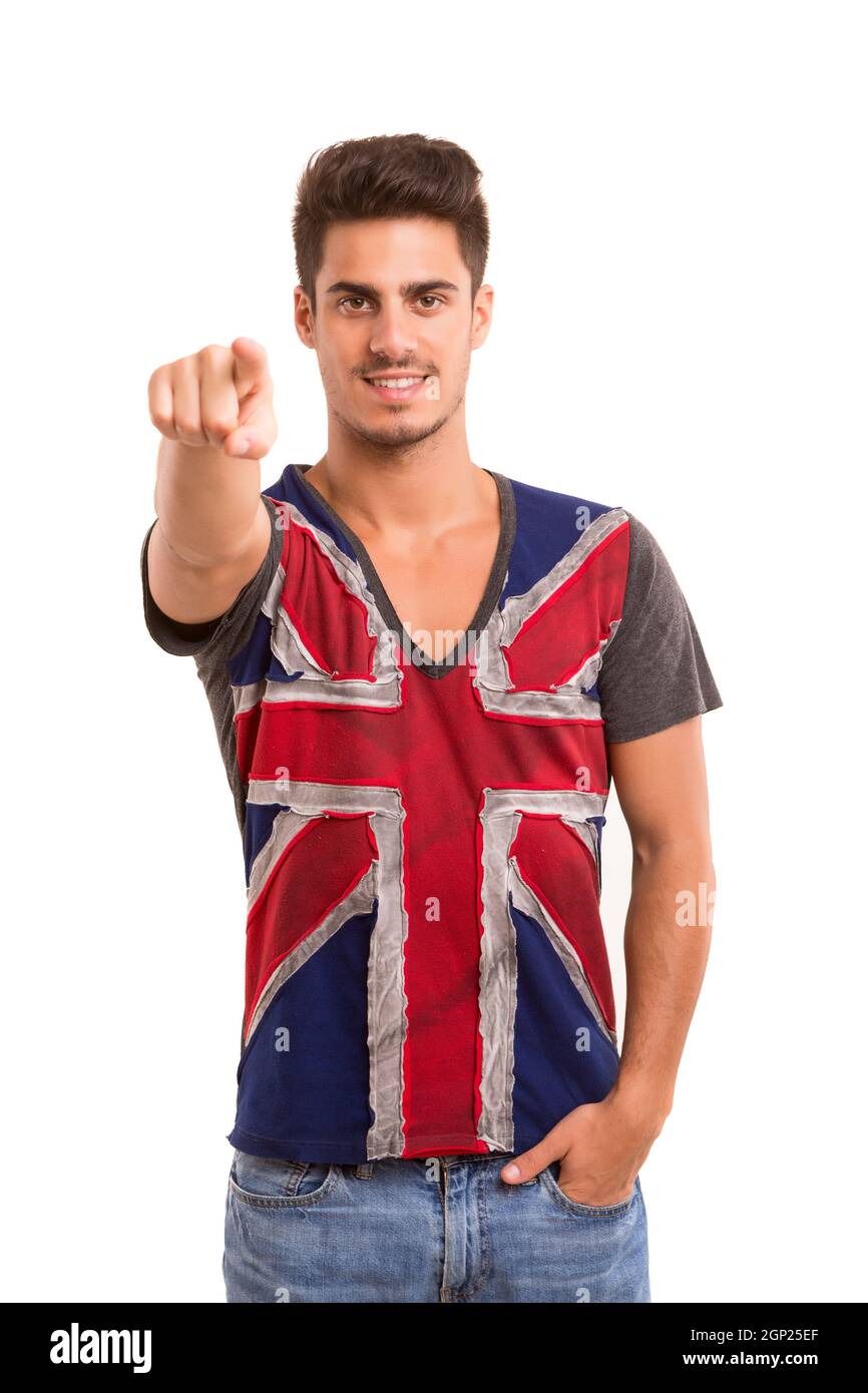 Handsome young man pointing at you, isolated over white background ...
