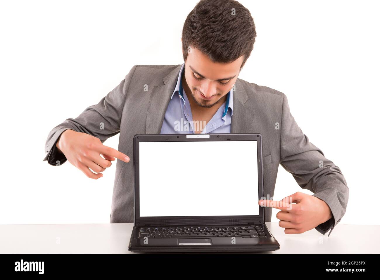 Young man presenting your product in a laptop computer Stock Photo - Alamy