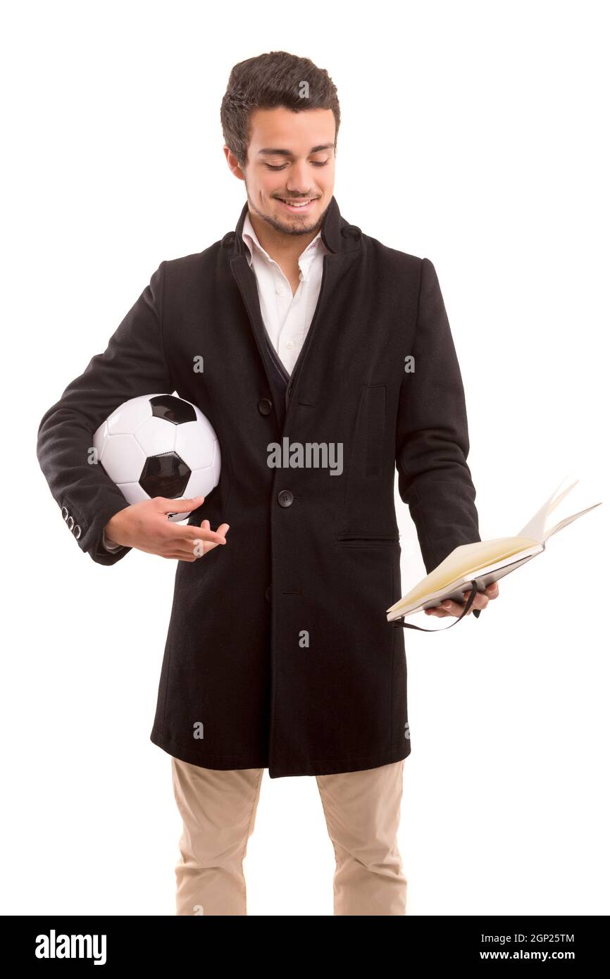 Studio picture of a handsome young football coach Stock Photo - Alamy