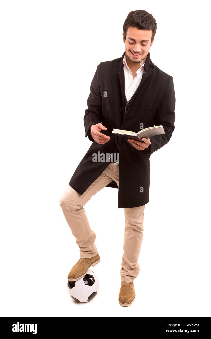 Studio picture of a handsome young football coach Stock Photo - Alamy