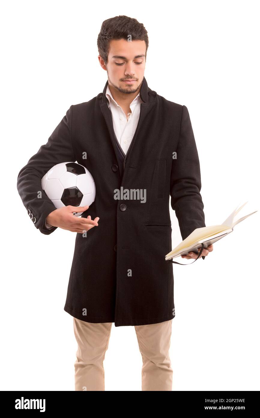 Studio picture of a handsome young football coach Stock Photo - Alamy