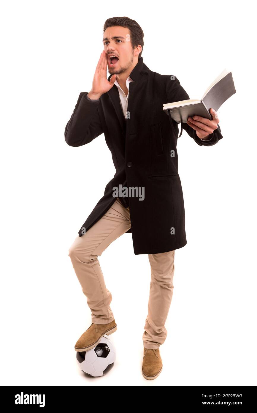 Studio picture of a handsome young football coach Stock Photo - Alamy