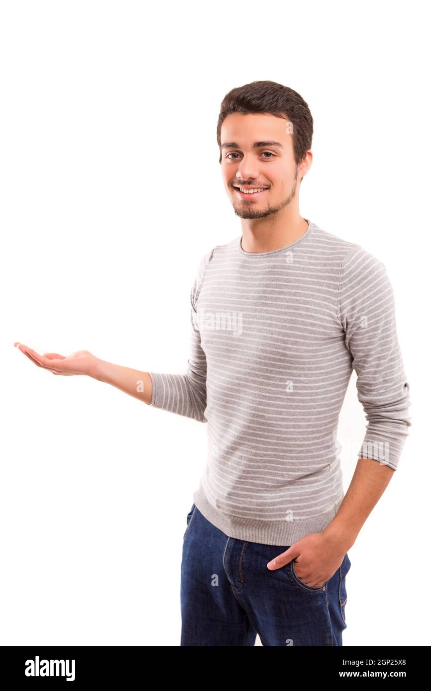 Young man presenting your product, isolated over a white background ...