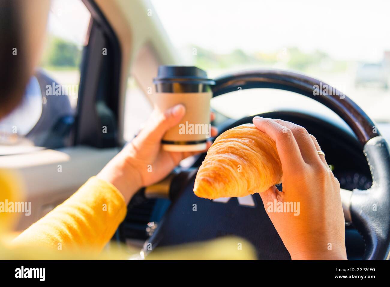 Business woman eating on the go hi-res stock photography and images - Alamy