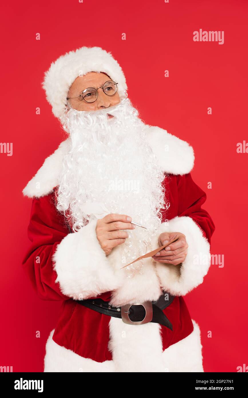Person in costume holding feather hi-res stock photography and images ...