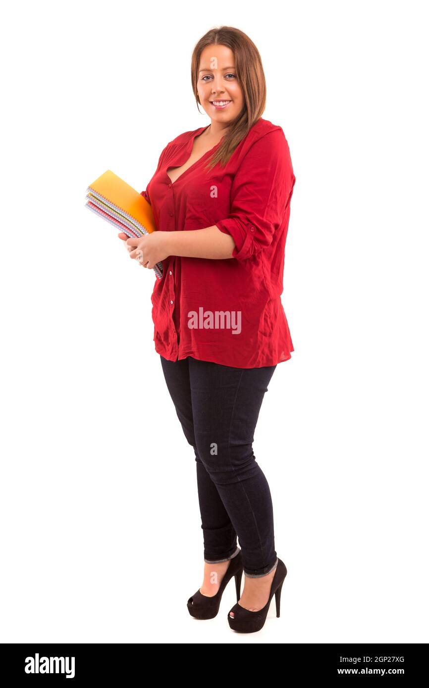 A beautiful large student woman, posing isolated over white background ...