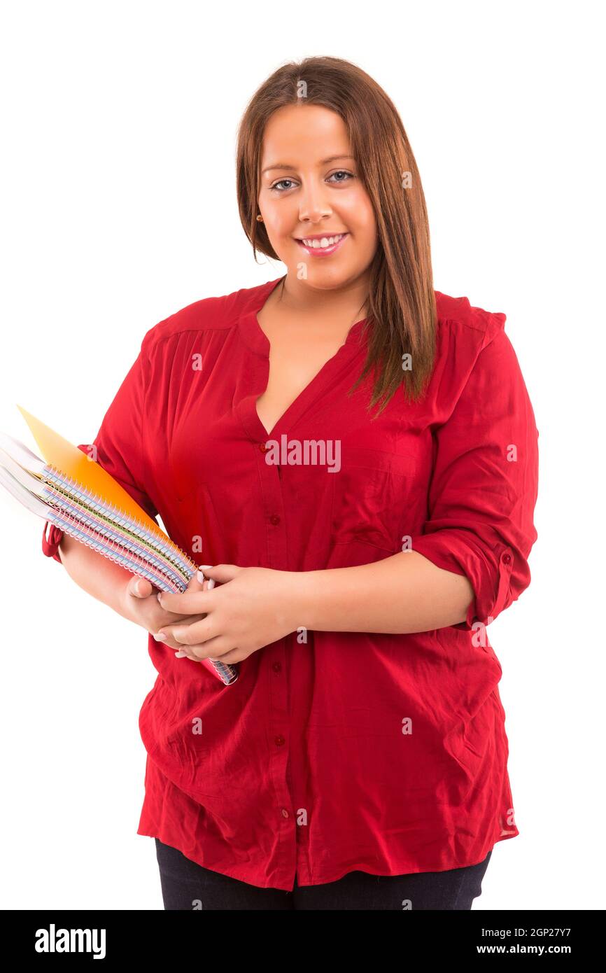 A beautiful large student woman, posing isolated over white background ...