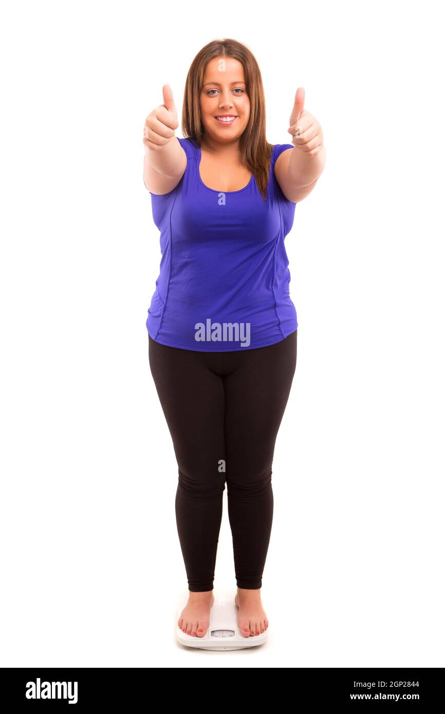 Large woman very happy with the results of her new diet Stock Photo - Alamy