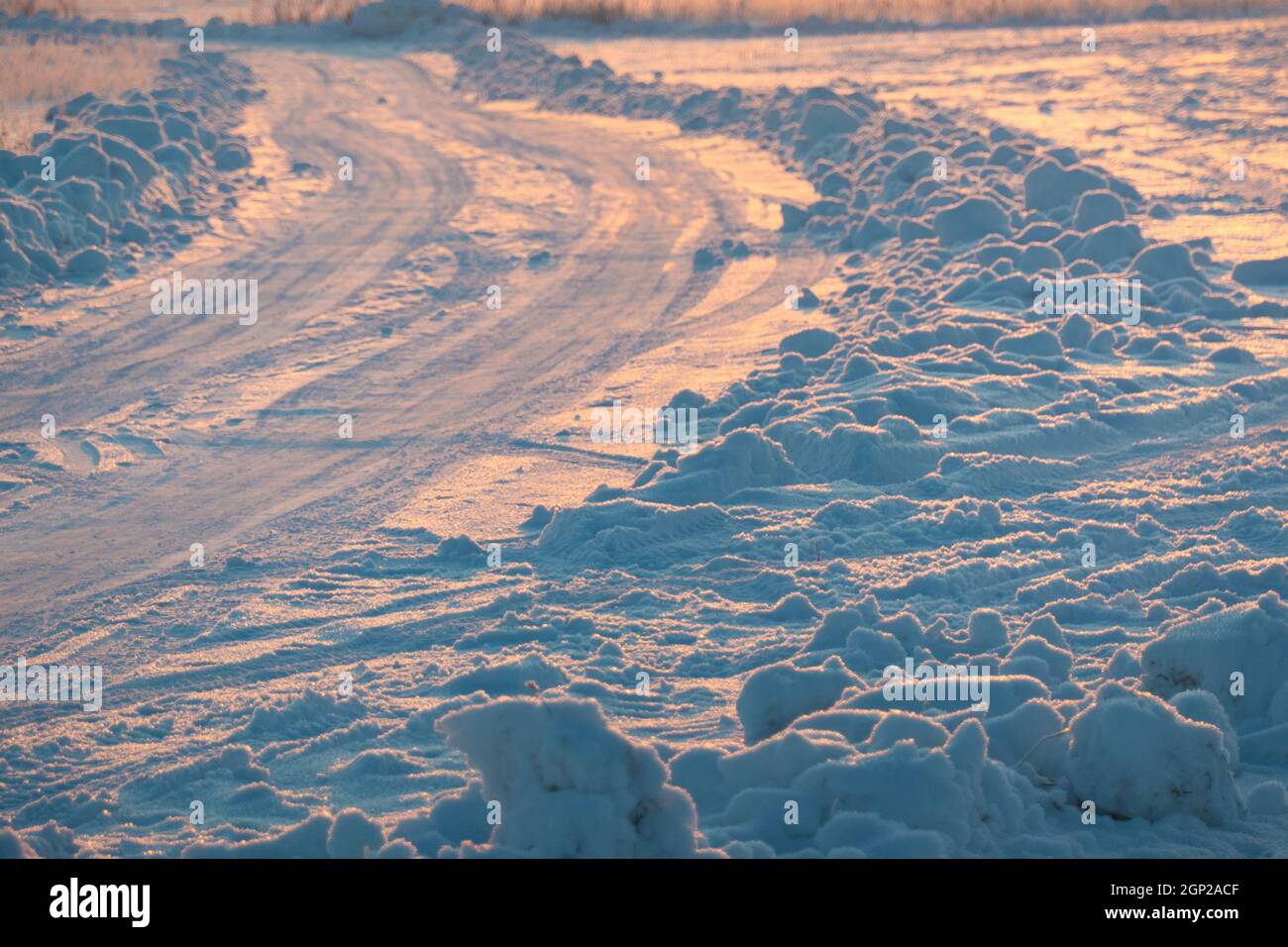 winter landscape, tire tracks on the snow, snow road Stock Photo - Alamy