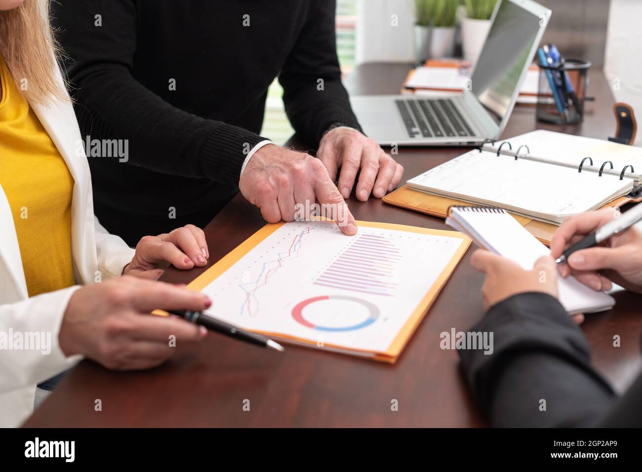 Group of three people working together. Teamwork concept Stock Photo ...