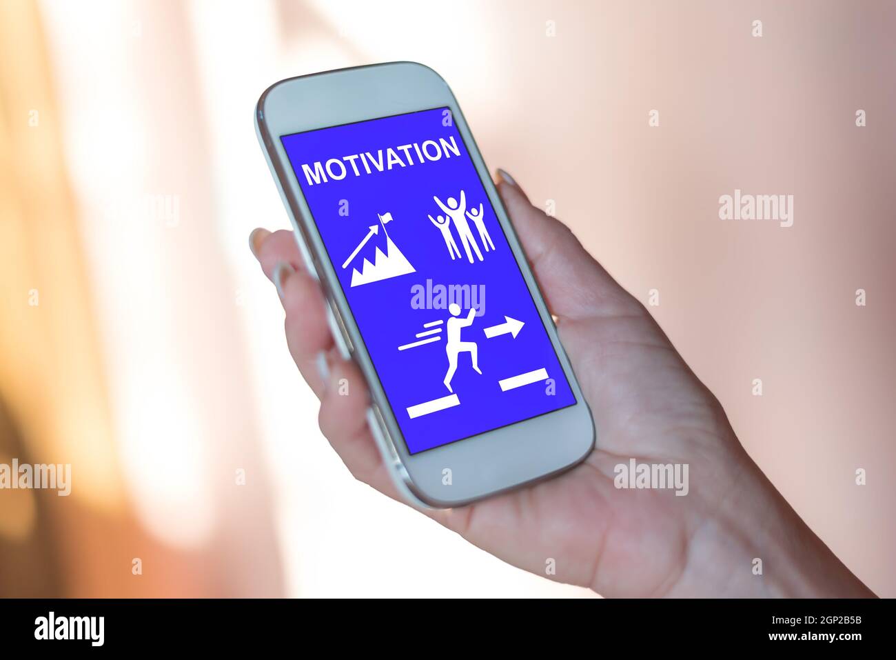 Smartphone screen displaying a motivation concept Stock Photo - Alamy