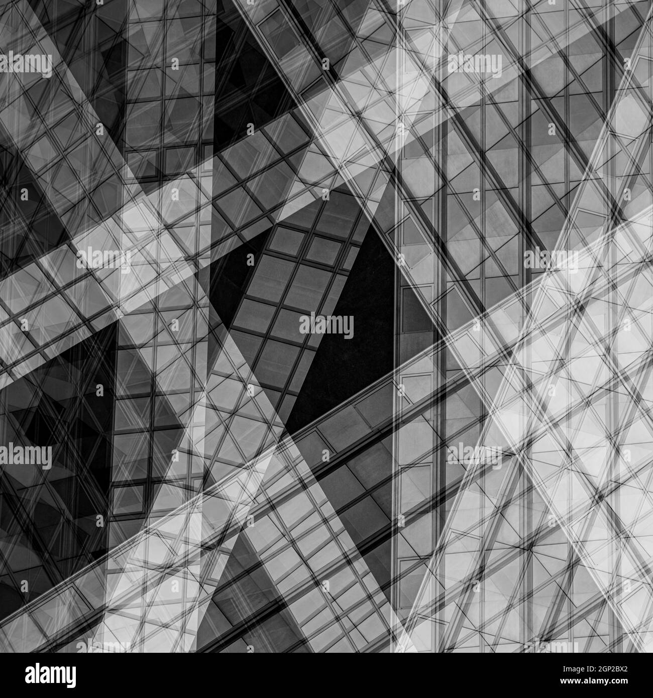 Grayscale shot of the windows of a glass skyscrape Stock Photo - Alamy