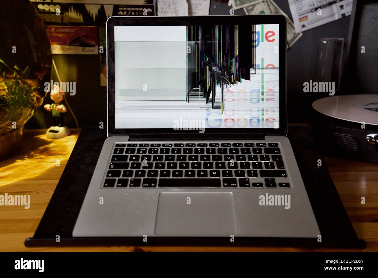 Laptop with a smashed screen (MacBook Pro, Retina 13-inch 2015) with a ...