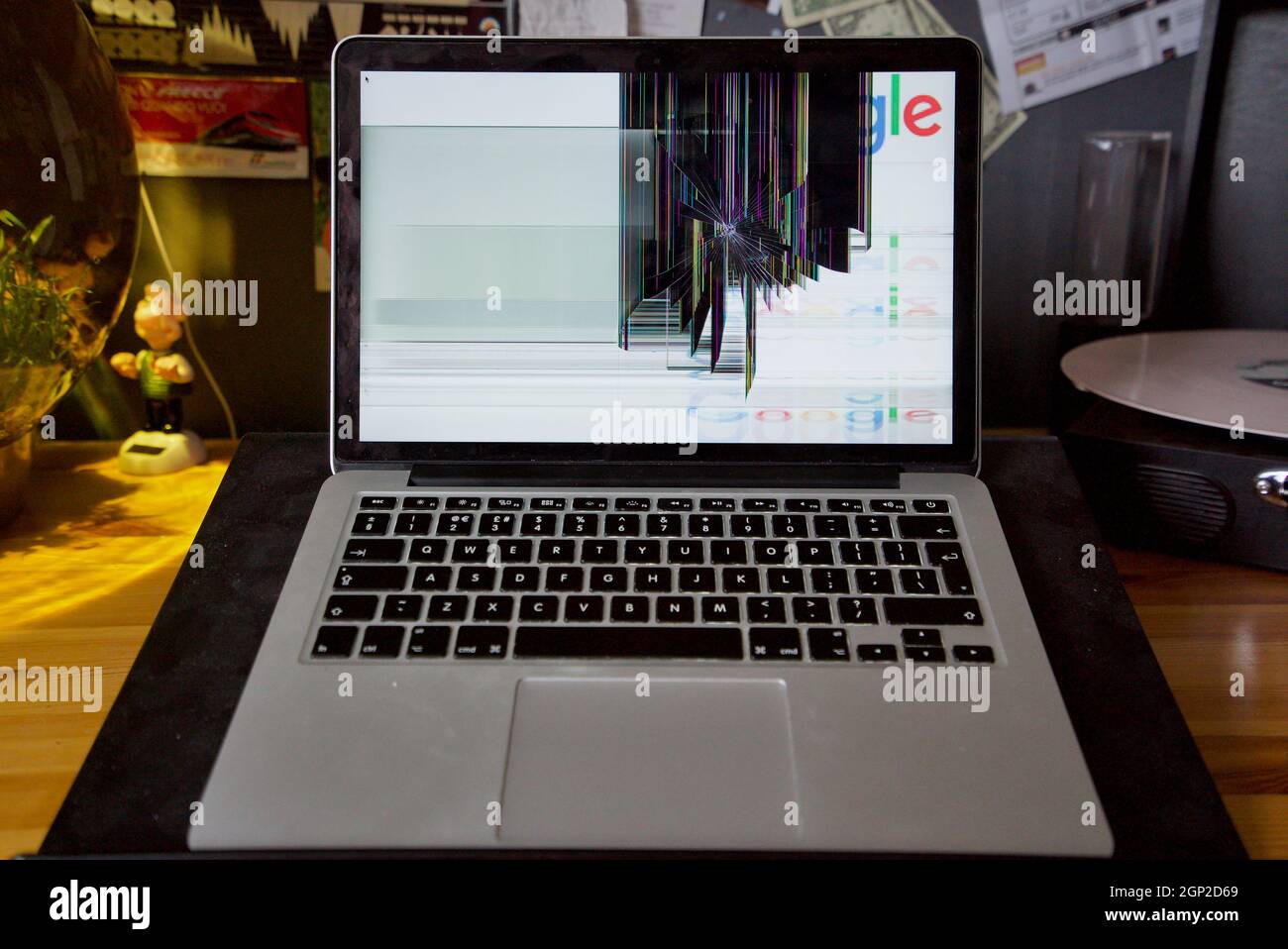 Laptop with a smashed screen (MacBook Pro, Retina 13-inch 2015) with a ...