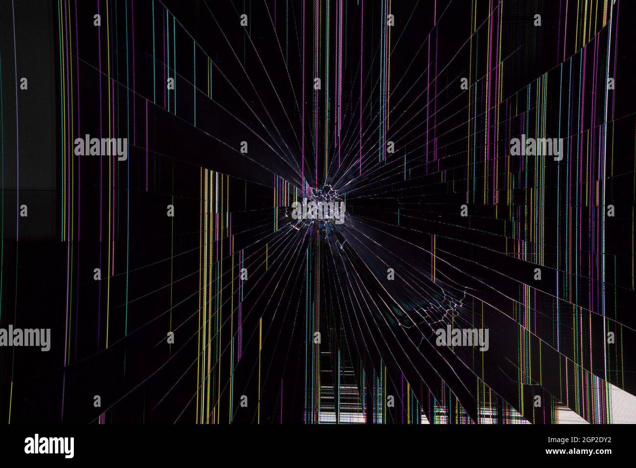 Close up laptop with a smashed screen (MacBook Pro, Retina screen) with ...