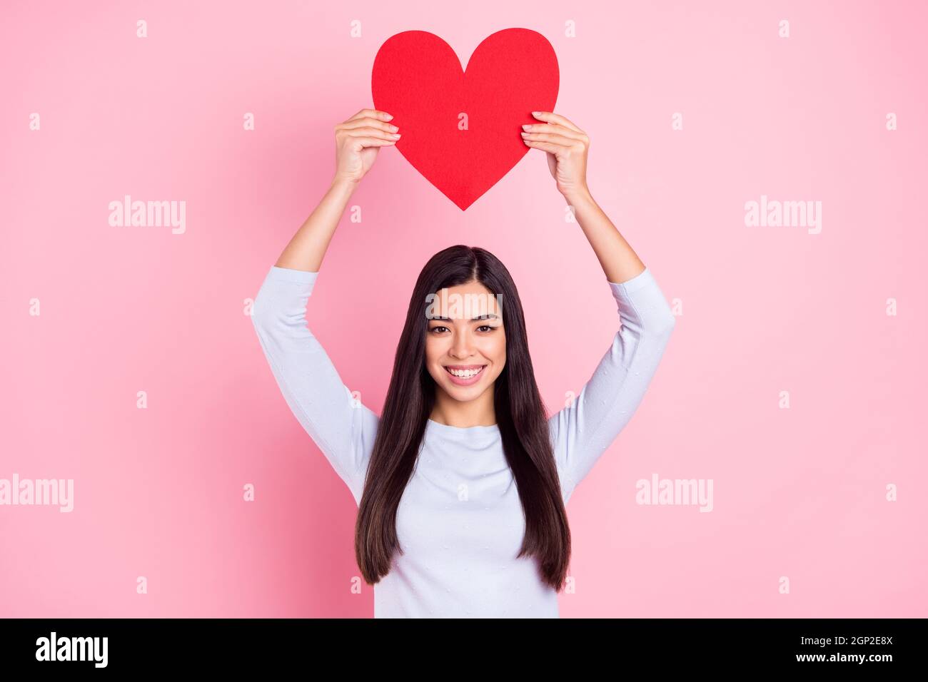 Photo portrait of girl showing demonstrating red heart fell in love ...