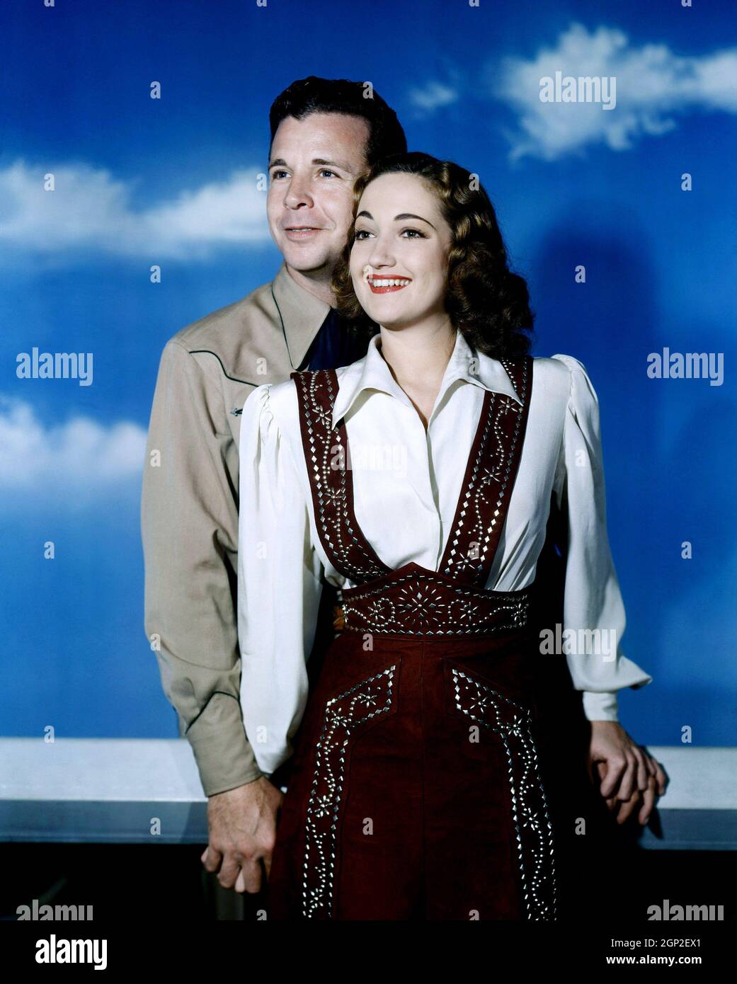 RIDING HIGH, from left, Dick Powell, Dorothy Lamour, 1943 Stock Photo ...
