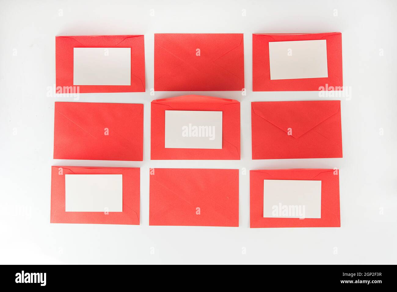 red letter envelope on white background Stock Photo - Alamy