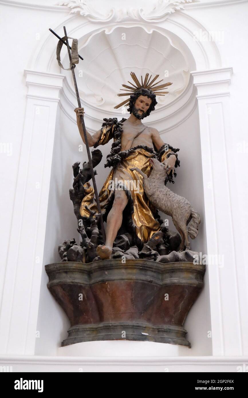 Saint John the Baptist, Altar in Collegiate church in Salzburg Stock ...