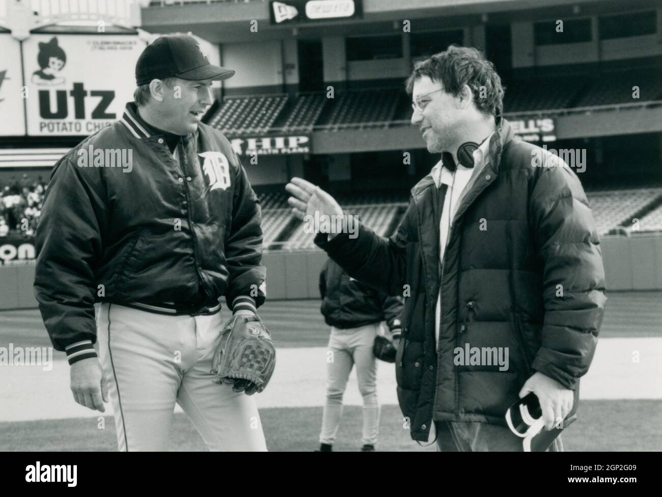 FOR LOVE OF THE GAME, from left: Kevin Costner, Sam Raimi, director, on ...