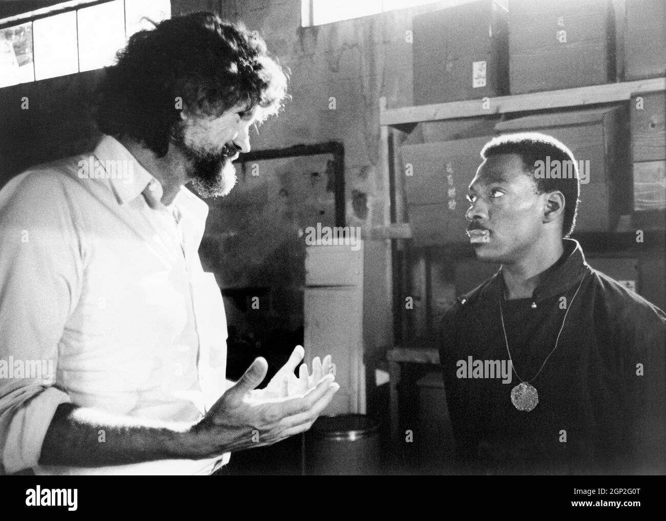 THE GOLDEN CHILD, from left: director Michael Ritchie, Eddie Murphy ...
