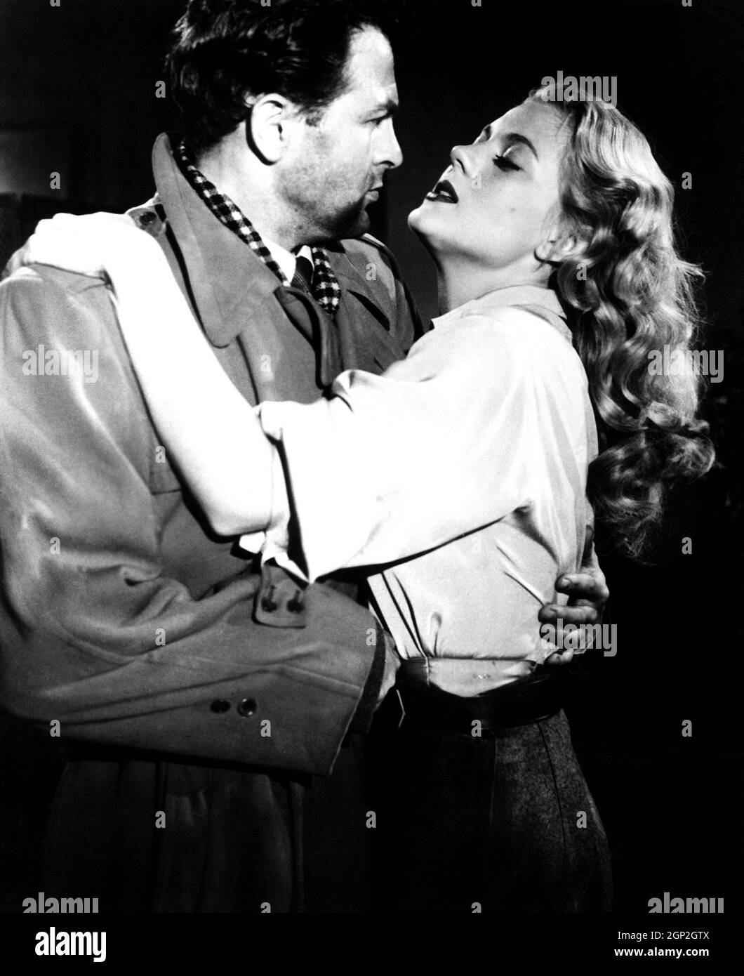 I, THE JURY, from left, Biff Elliot, Peggie Castle, 1953 Stock Photo ...