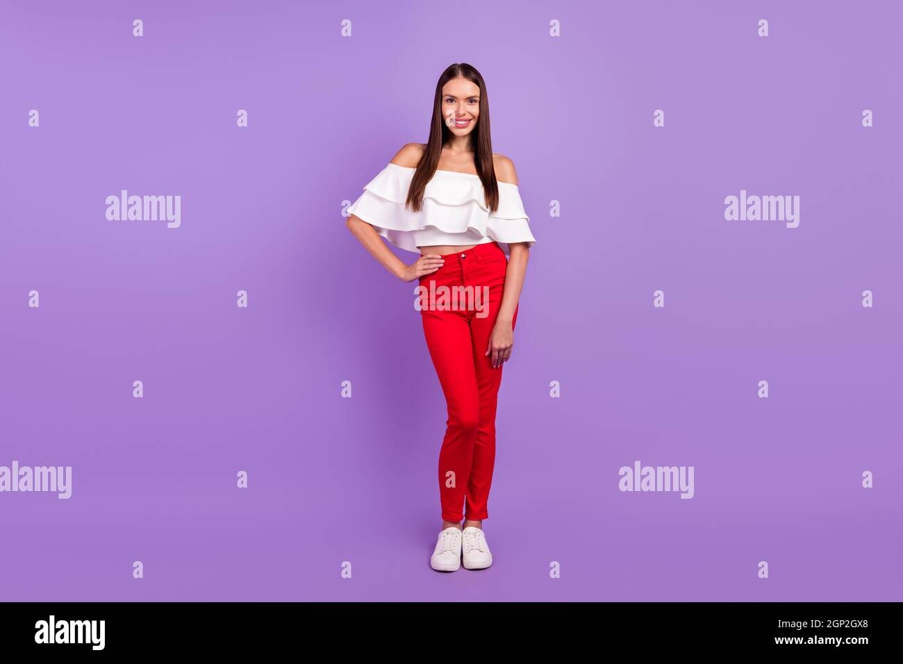 Photo of charming pretty positive lady hands hips wear white blouse ...