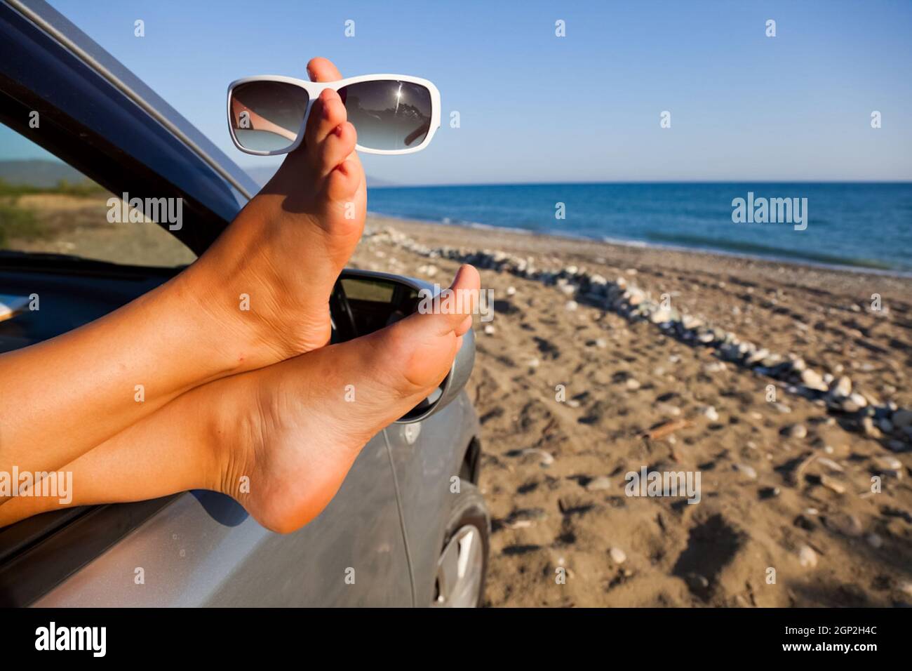 Legs Sticking Out Of Car High Resolution Stock Photography and Images ...