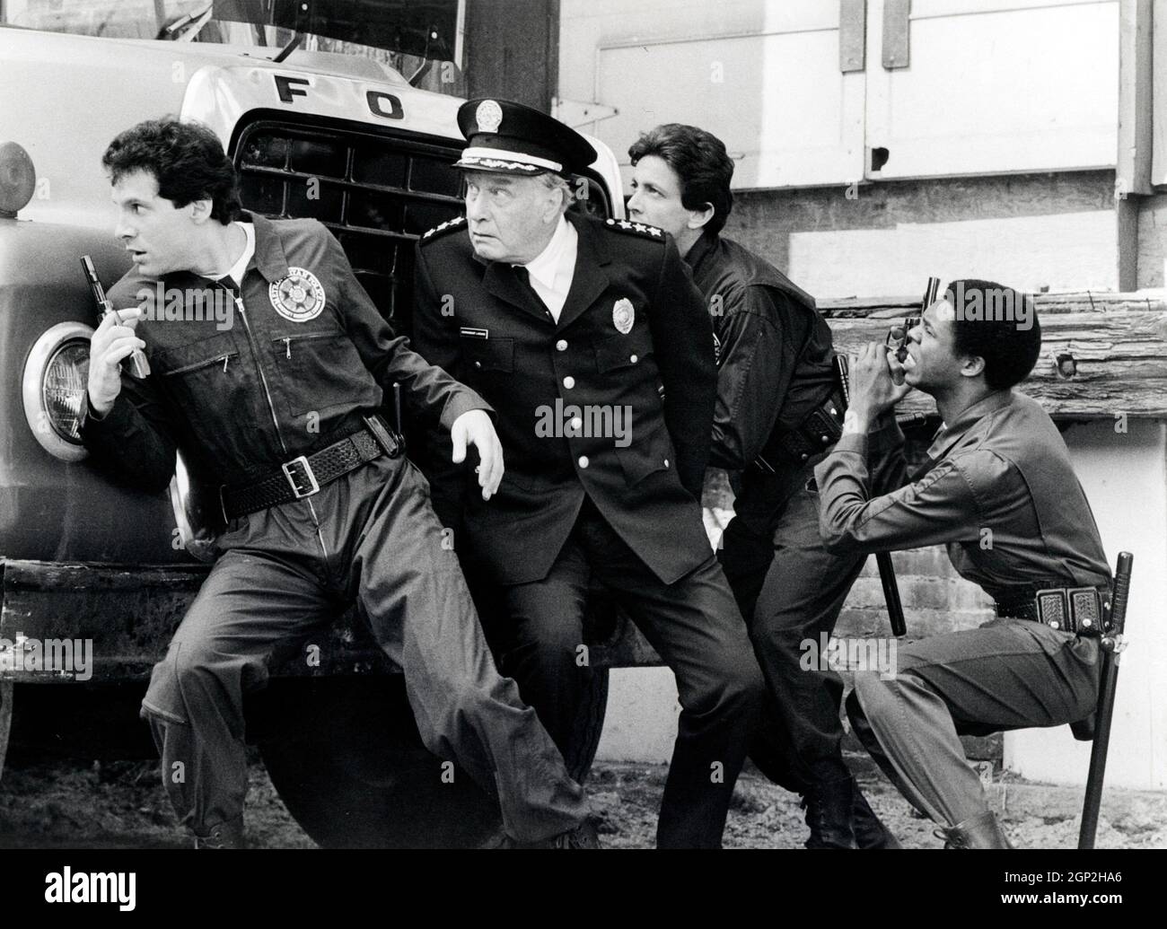 POLICE ACADEMY, from left: Steve Guttenberg, George Gaynes, Andrew ...