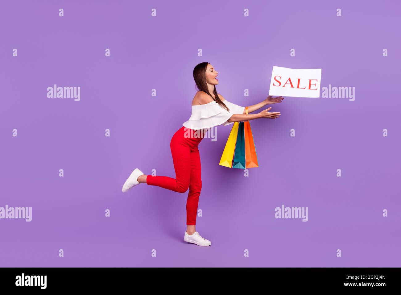 Photo of crazy lady hold store bags catch sale card wear white blouse ...