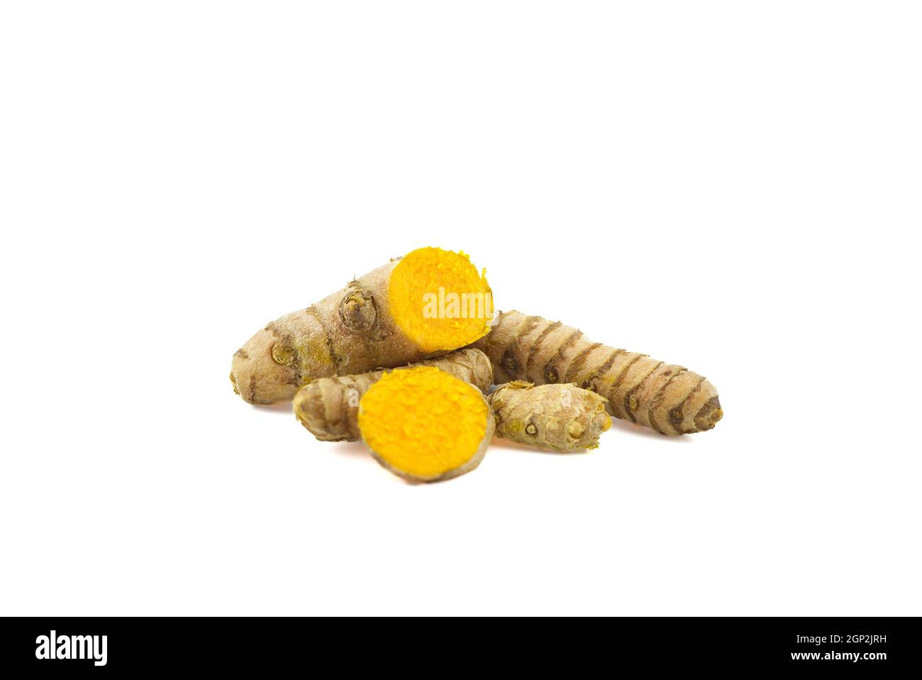 Fresh raw turmeric roots isolated on white background Stock Photo - Alamy