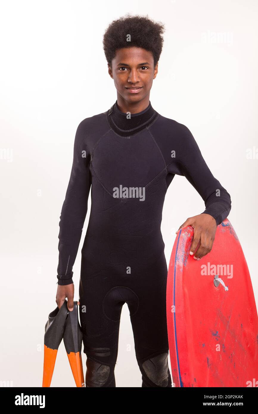 A young black bodyboarder posing in studio Stock Photo - Alamy