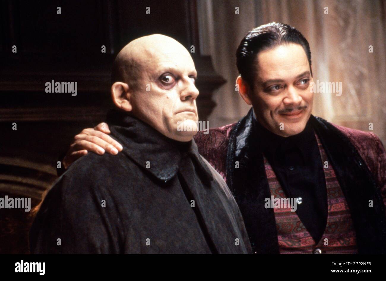 THE ADDAMS FAMILY, from left: Christopher Lloyd, Raul Julia, 1991. ph ...