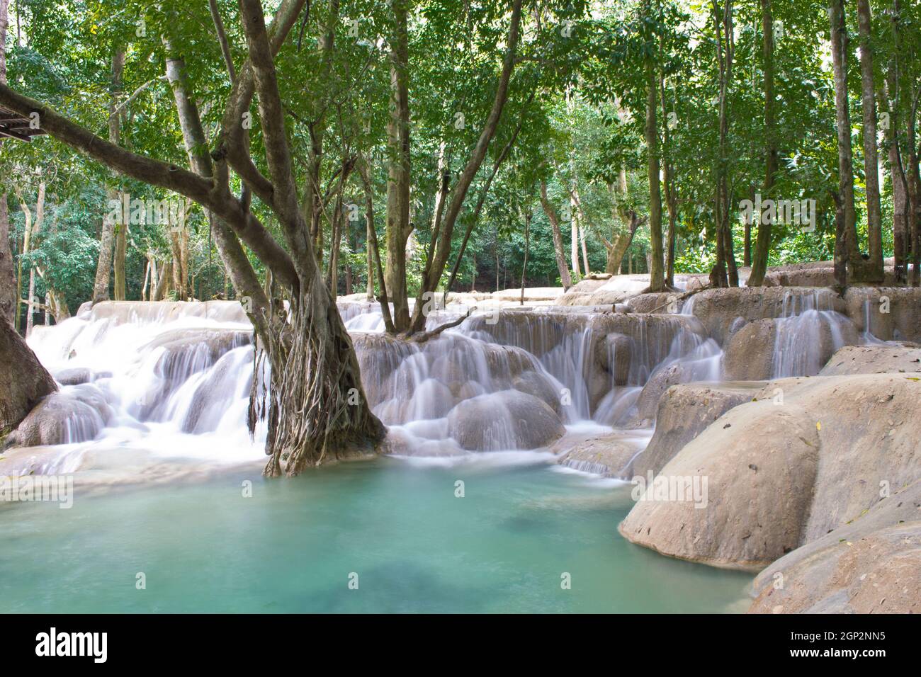 Laos Tad Sae Waterfall in the green forest, long exposure showing the ...