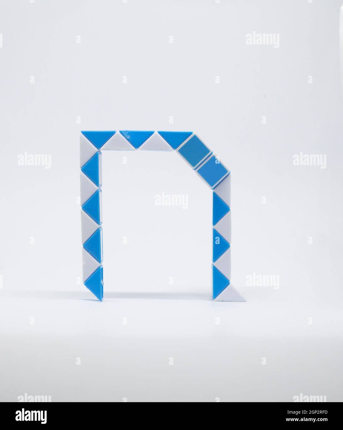 Letter "n" made of blue and white triangles on a white background Stock ...