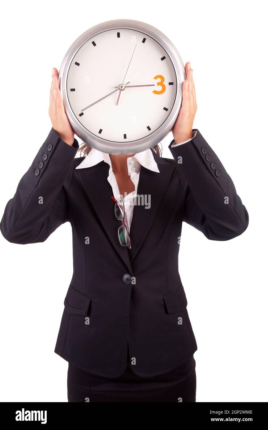 Business woman holding a clock, isolated Stock Photo - Alamy