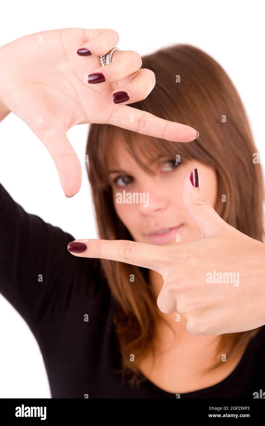 Young woman showing framing hand gesture - focus on hands Stock Photo ...